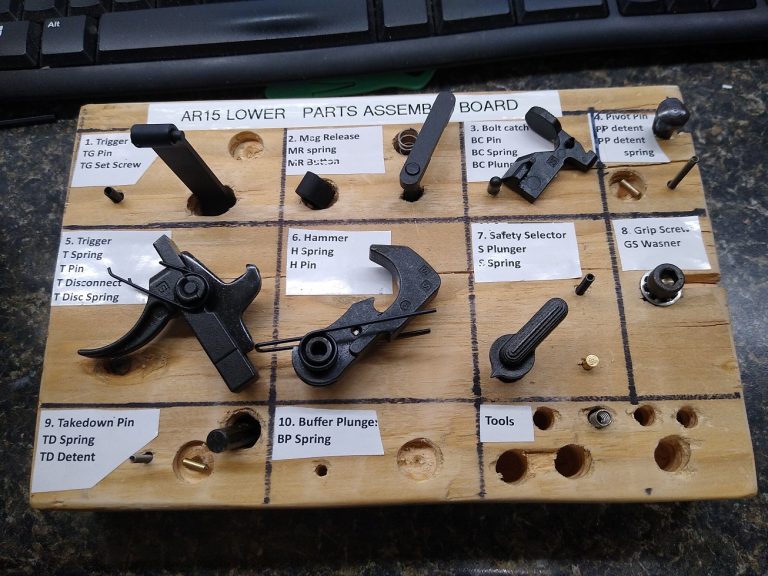 AR-15 Lower Builds. I used a piece of wood drilled with small holes.